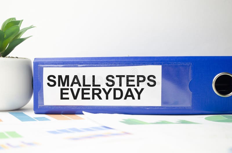 Small Steps Everyday Text Written on Blue Folder and Charts Stock Image ...