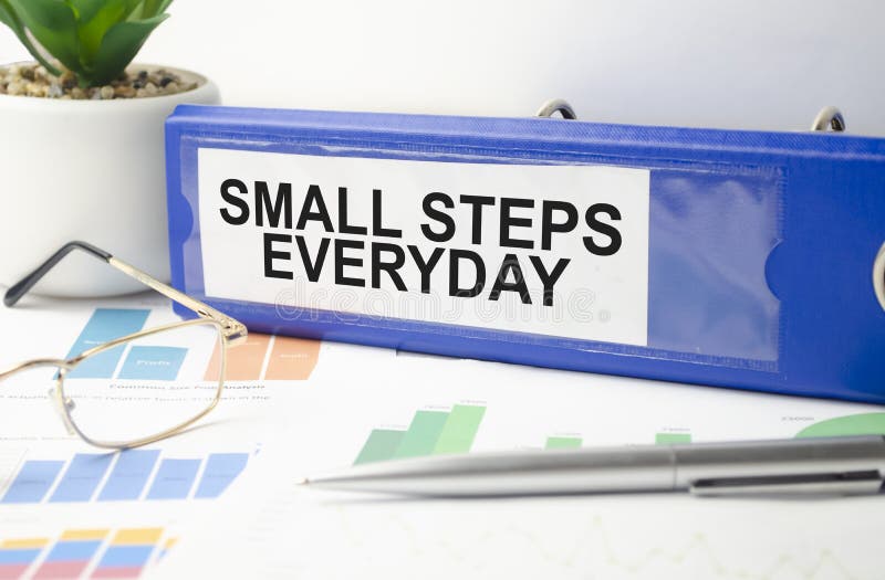 Small Steps Everyday Text Written on Blue Folder and Charts Stock Image ...