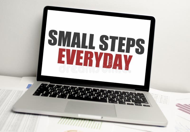 Small Steps Everyday Word on Laptop with Charts Stock Image - Image of ...