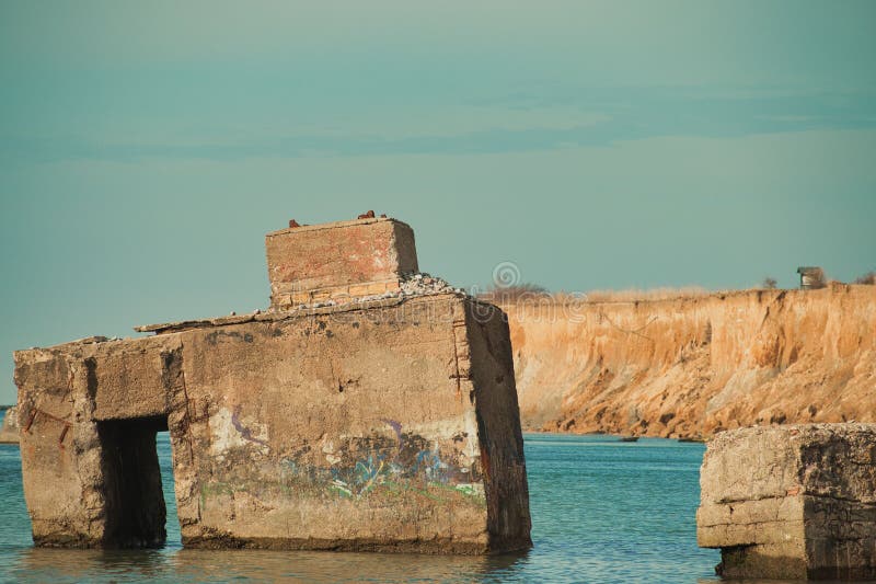 Small Stone Bomb Shelter on Shore of a Tranquil Sea Stock Image - Image ...