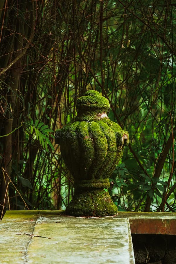 Small Stone Monument Covered with Moss on a Natural Background Stock ...
