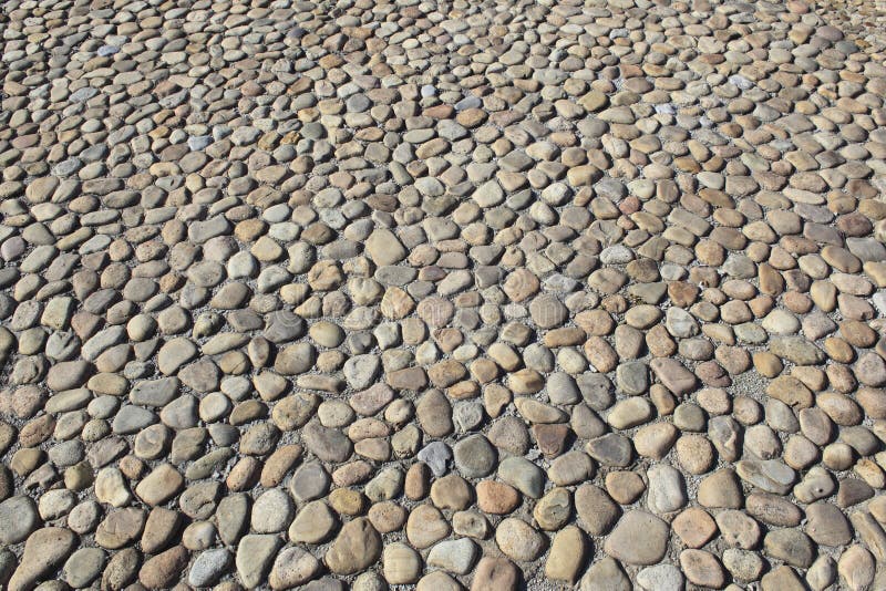 Small stone paved road stock photo. Image of color, gravel - 32080742