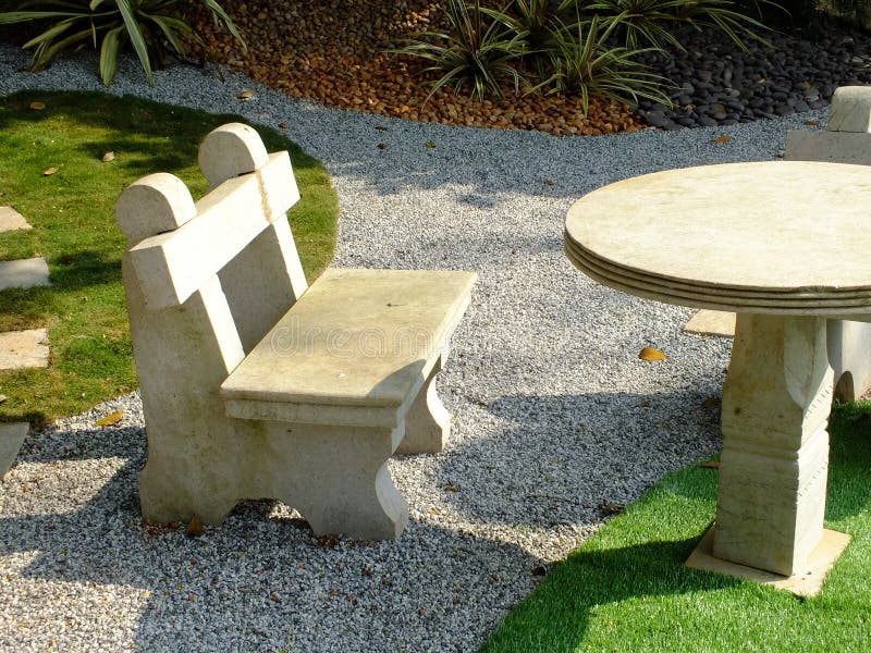 Small stone sitting bench stock photo. Image of outside - 191698700