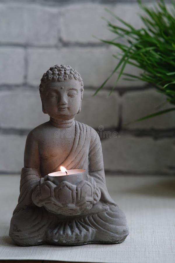 A Small Stone Statue of Buddha Stock Image - Image of landmark, amulets ...