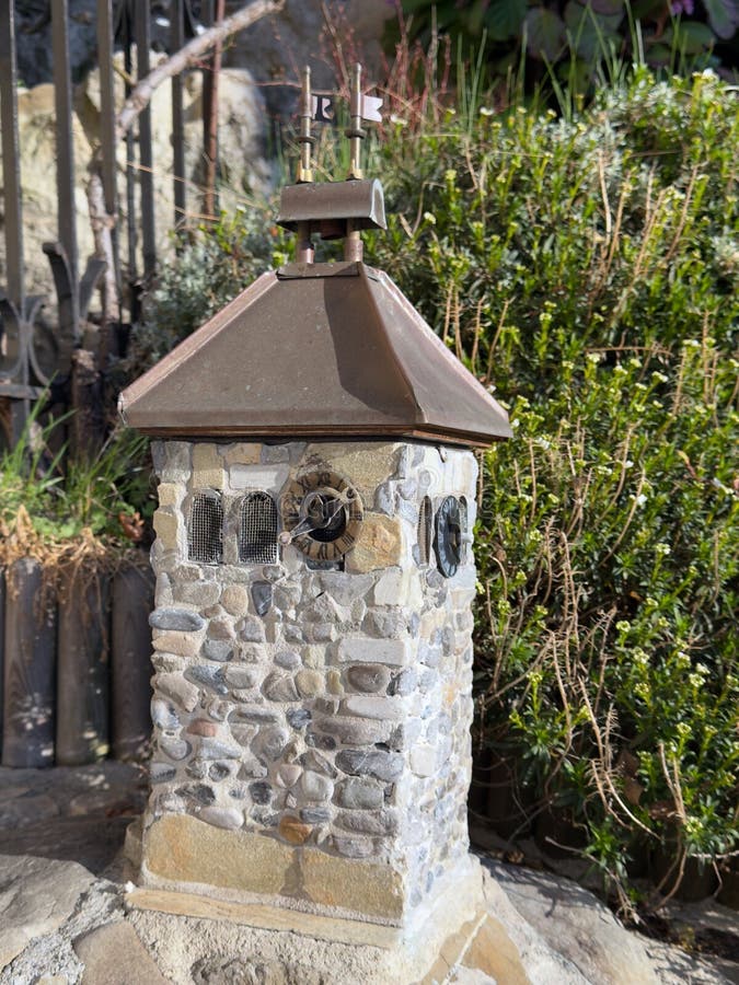 A Small Stone Tower with a Clock on Its Facade. Stock Photo - Image of ...