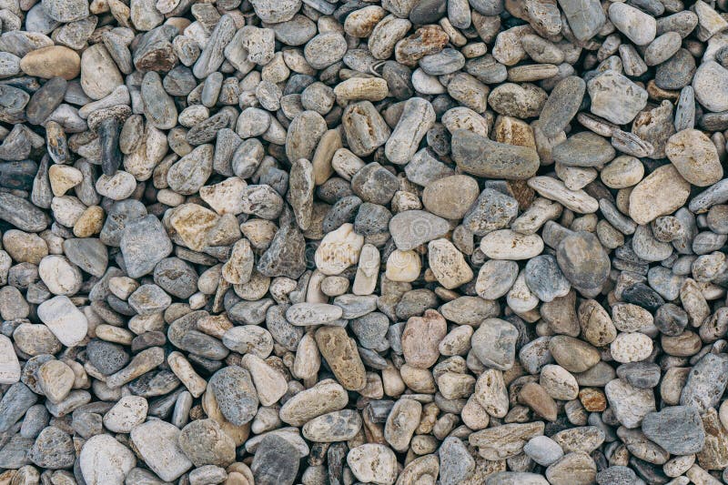 Small stones background stock photo. Image of pebble - 370009044