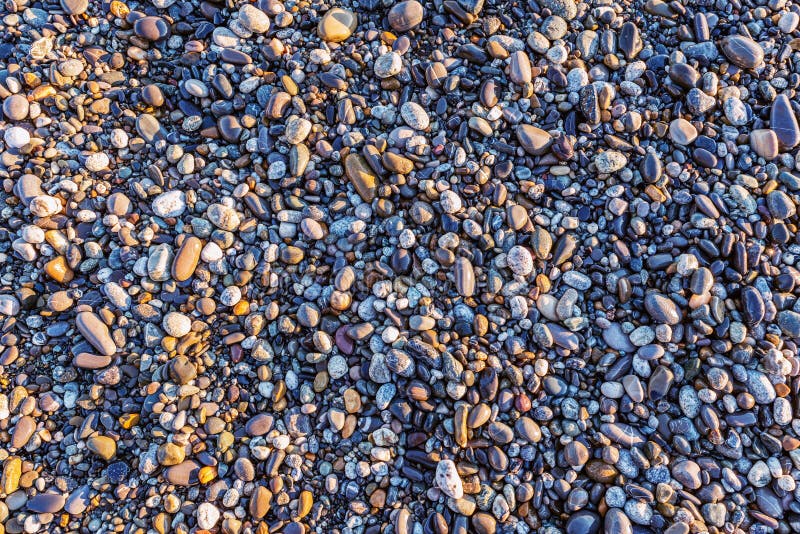 Small Stones on the Beach at Sunset Stock Image - Image of backdrop ...