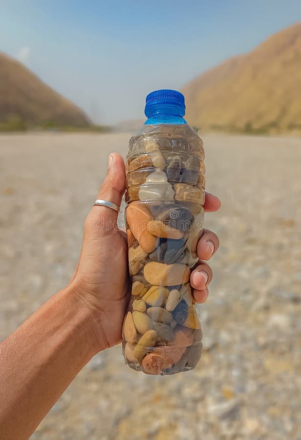 Small stones in bottle stock photo. Image of abstract - 255275838