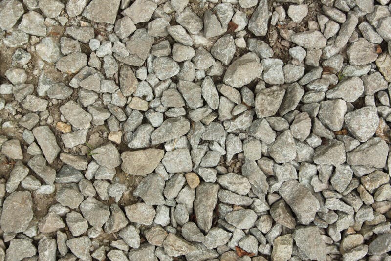Small Stones on a Ground with Sand for Background, Design Stock Photo ...