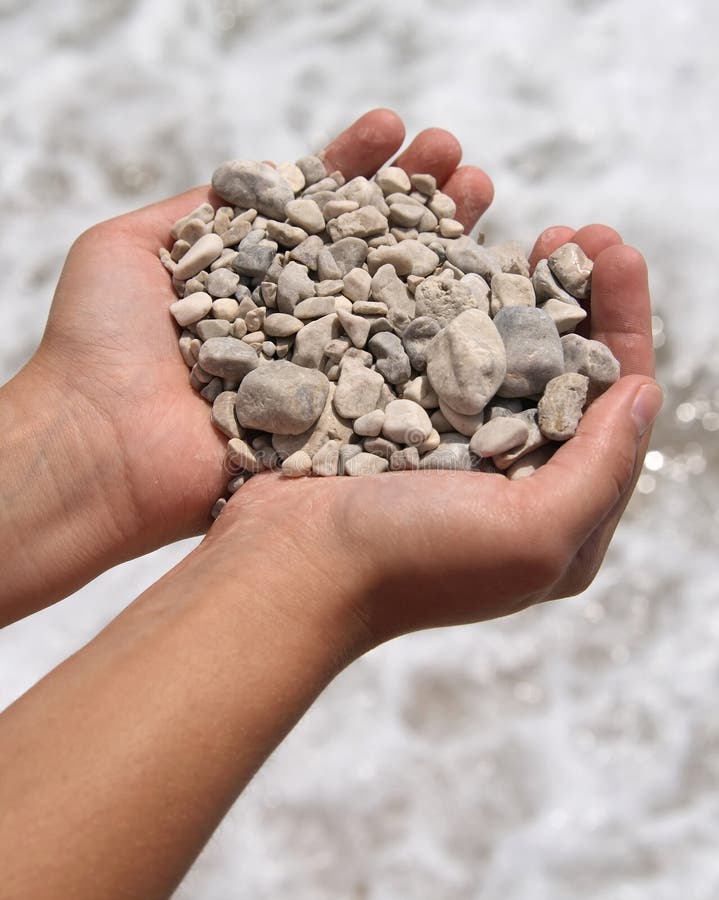 Small stones in hands stock photo. Image of delicate, perfect - 4353656