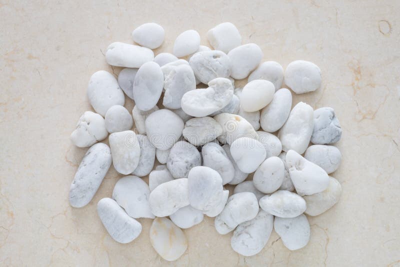 Small stones on rock table stock image. Image of materials - 58667573