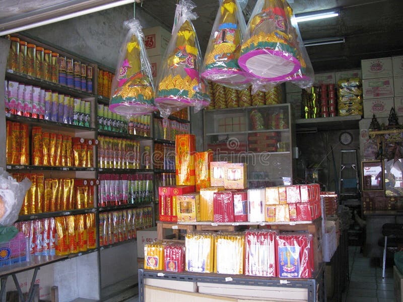 Small Store Interior with Hanging Decorations and Shelves Packed with ...