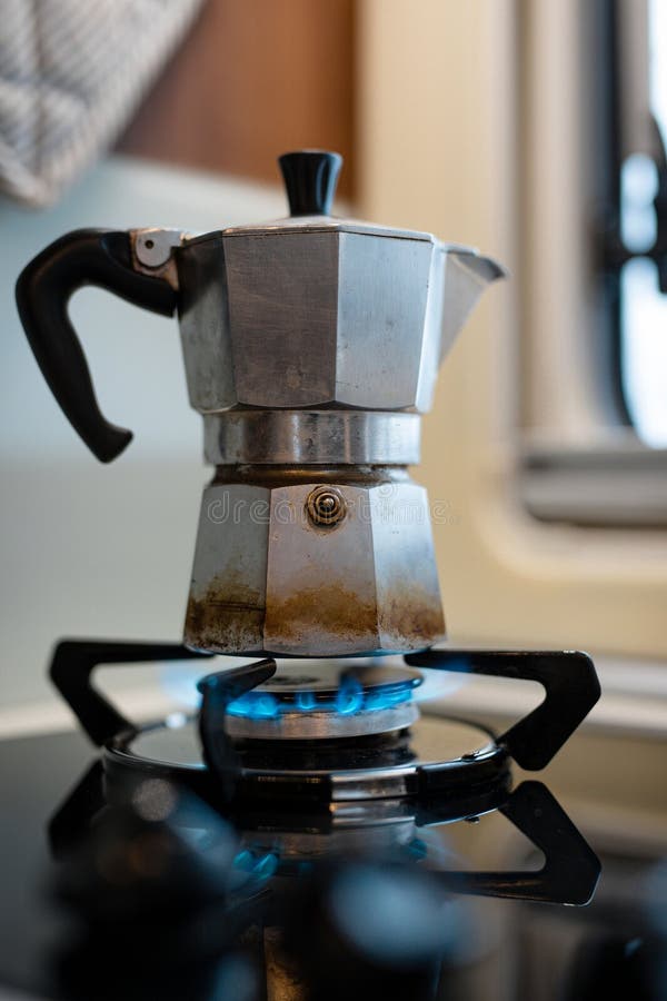 A Small Stove Top with a Pot on it& X27;s Burner Stock Image - Image of ...