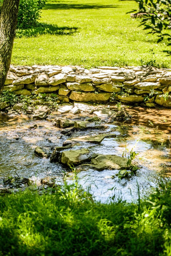 Small Stream Lined with Stone and Grass Stock Photo - Image of green ...