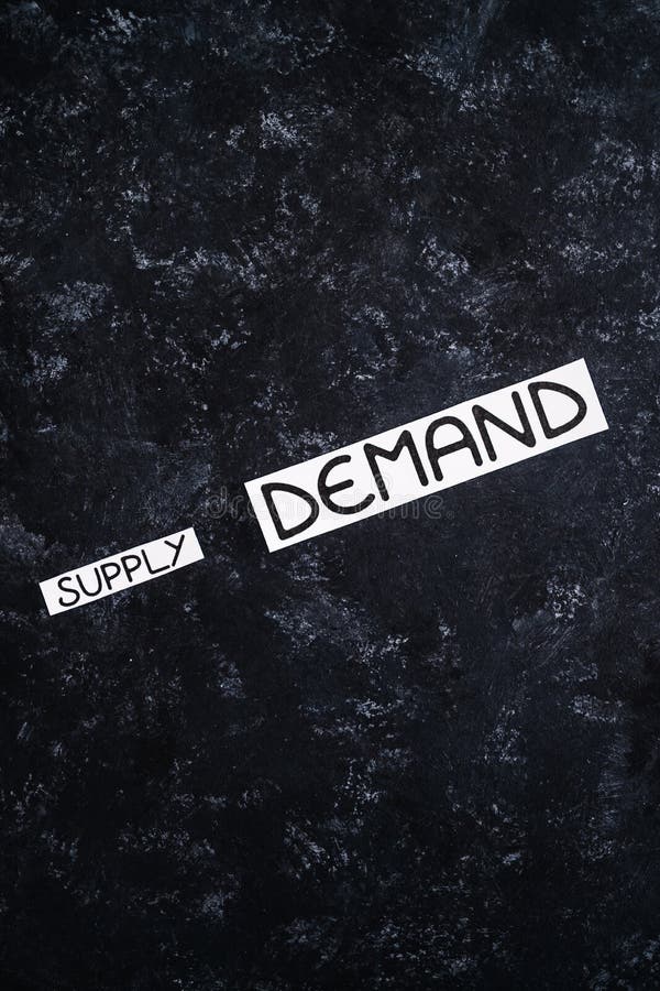 Small Supply Text and Big Demand Text on Dark Background, Concept of ... Small Supply Text and Big Demand Text on Dark Background, Concept of ...