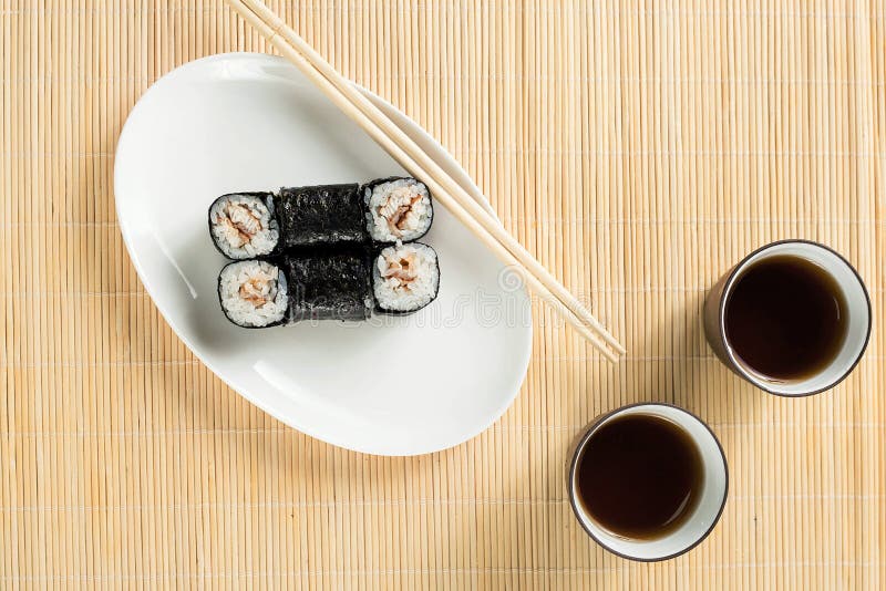 Small Sushi Roll on a Wooden Table Top View Stock Image - Image of ...