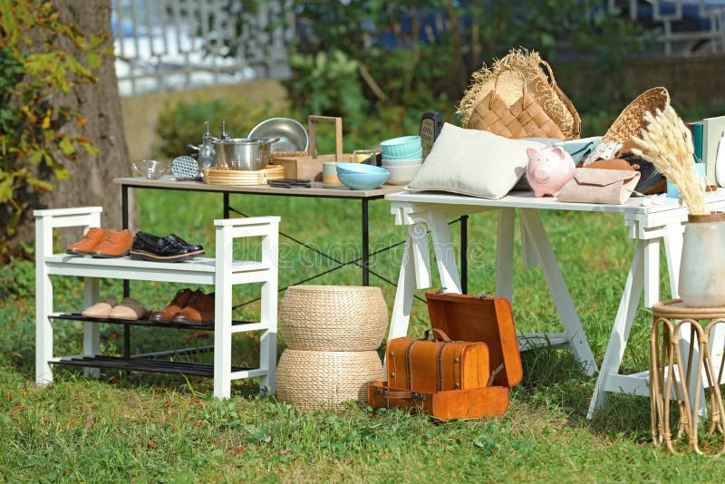 Small Tables with Many Different Items on Garage Sale in Yard Stock ...