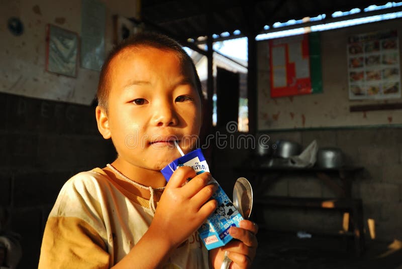 Small Thai school boy editorial photography. Image of drinking - 20707452