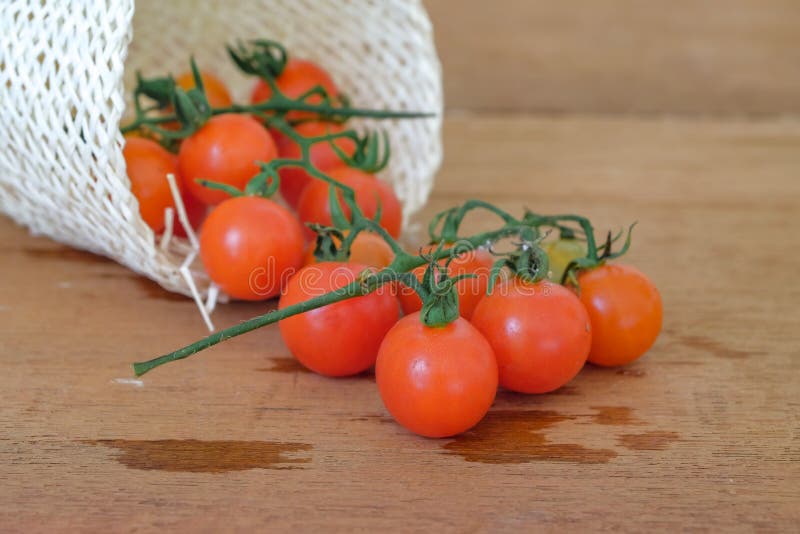 Small Tomato Spill Out of Basket.Food Stock Image - Image of spring ...