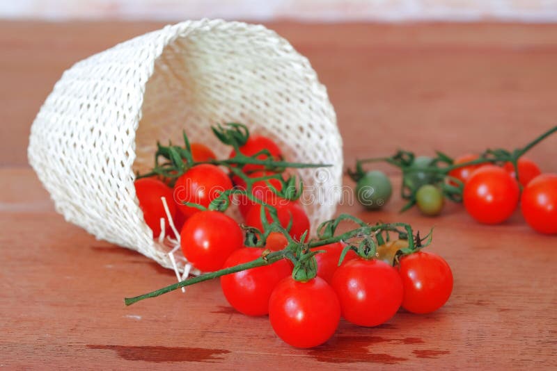 Small Tomato Spill Out of Basket.Food Stock Photo - Image of cherry ...