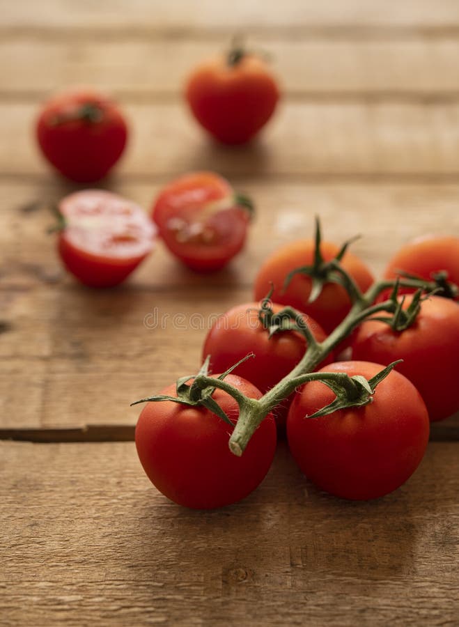 Small Tomatoes on a Wooden Table Stock Photo - Image of cherry, healthy ...