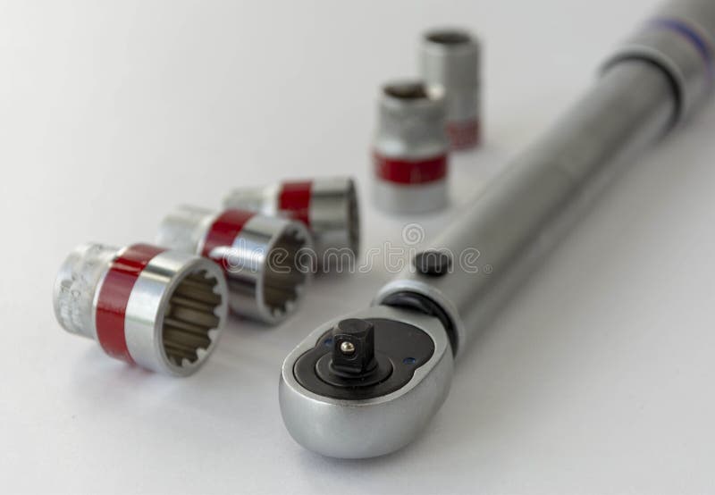 Small Torque Wrench Ratchet with Cap Heads Isolated on White Background ...