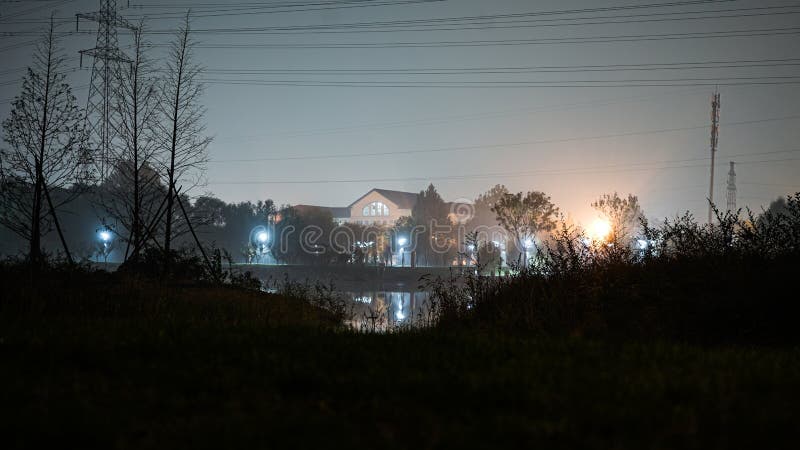 Small Town Shrouded in Haze at Night Stock Photo - Image of sunrise ...