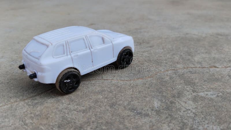 Small toy car on concrete stock image. Image of running - 291539939