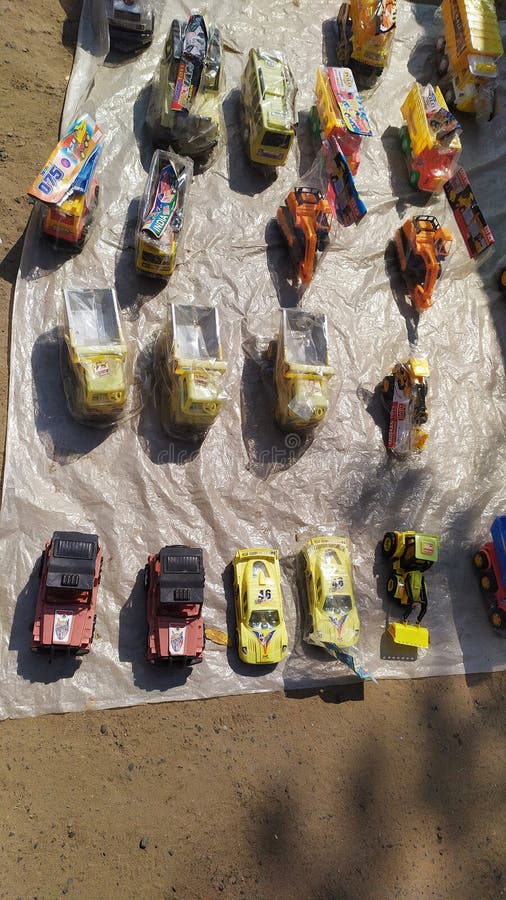 Small toy cars stock image. Image of cars, footwear - 199671981