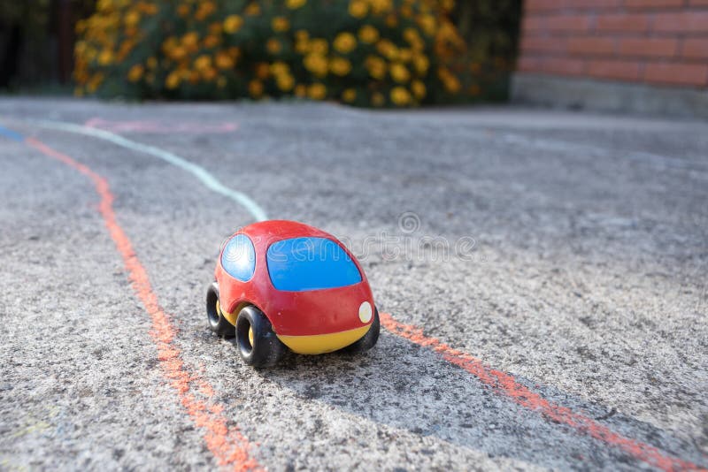 Small Toy Red Car on the Playground Stock Image - Image of automobile ...