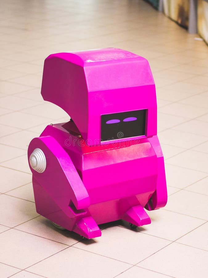 A Small Toy Robot in an Office Space_ Stock Image - Image of cyborg ...