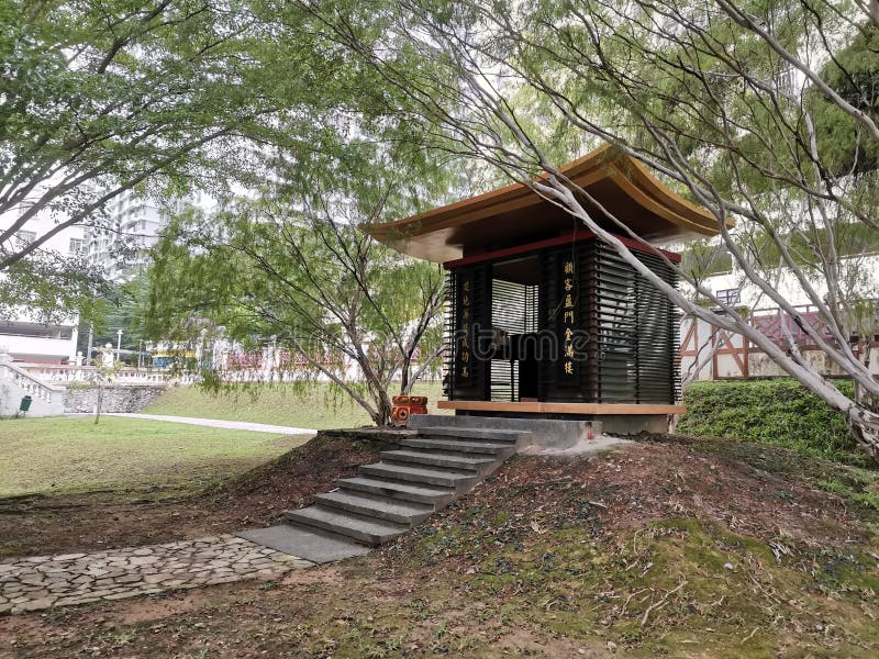 Small Traditional Pavilion Surrounded by Lush Trees in a Peaceful Park ...
