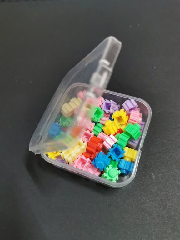 Small Transparent Plastic Container with a Hinged Lid, Partially Open ...