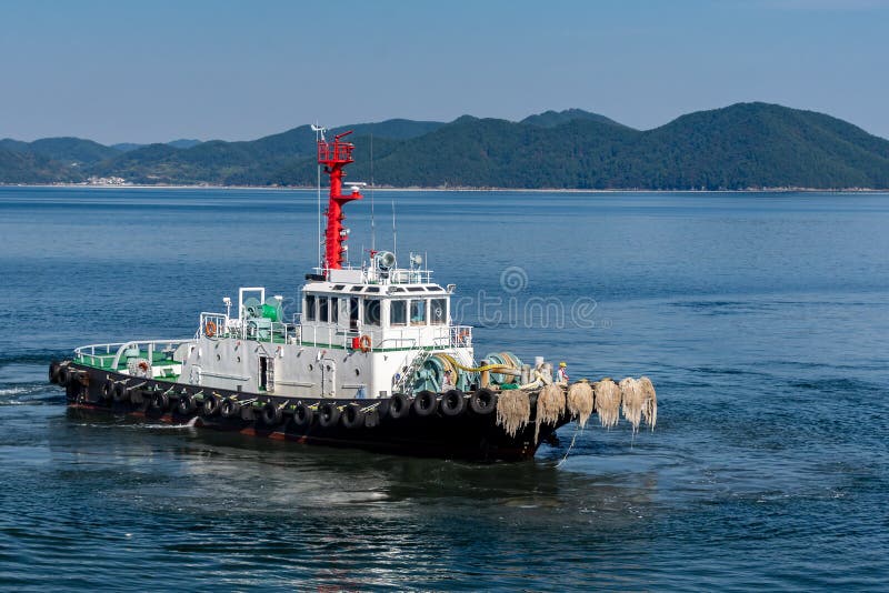 The Small Tug Vessel in the Sea Stock Photo - Image of vessel, ropes ...