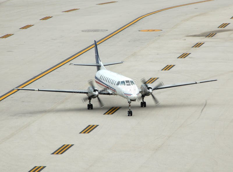Small Turboprop Airplane on Runway Stock Image - Image of runway, inter ...