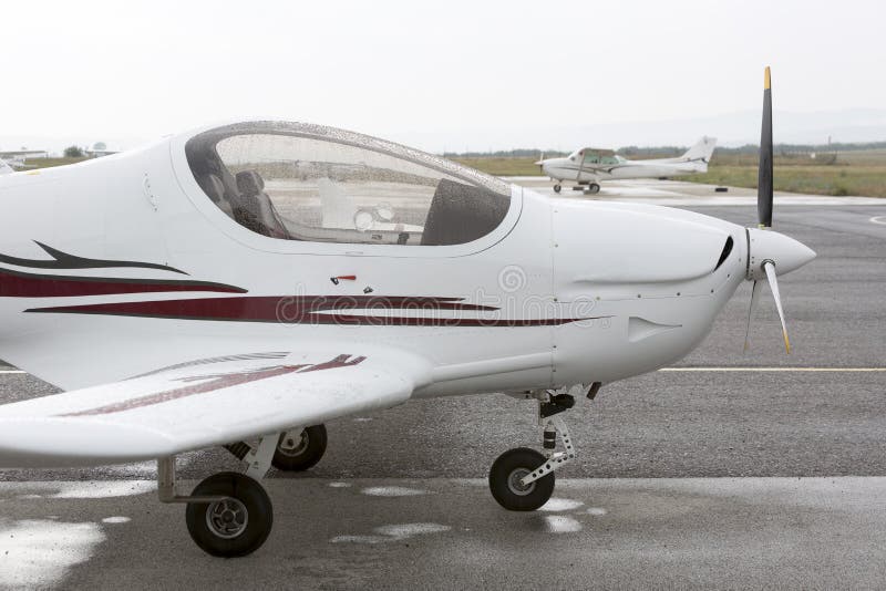 Small Two-seated Propeller Airplane Stock Photo - Image of runway ...