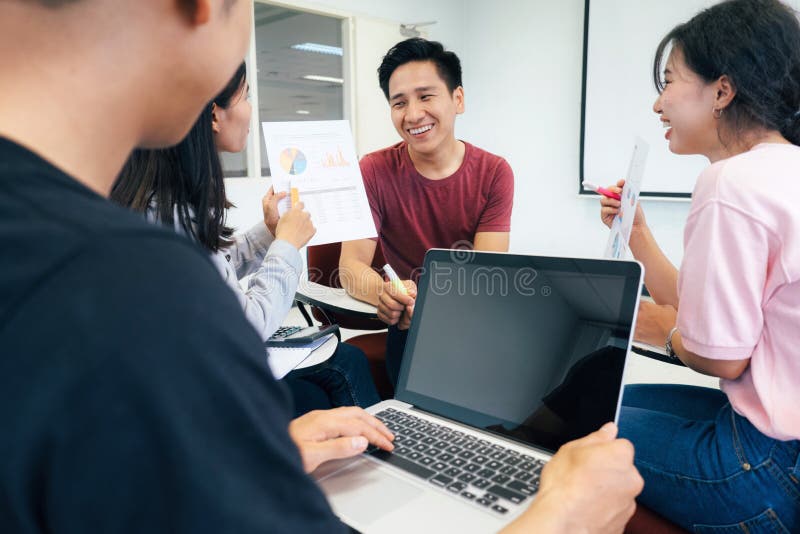 Small University Students Group Study and Discussion Together. Stock ...