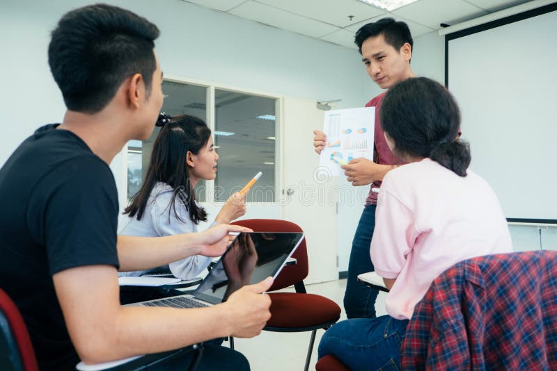 Small University Students Group Study and Discussion Together. Stock ...