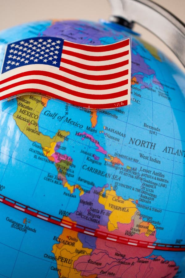 Small USA flag on globe stock image. Image of flag, patriotic - 382607537