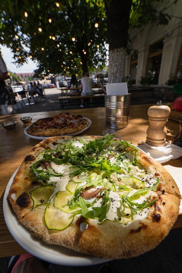 Small Vegetarian Pizza on a Table in a Street Cafe Stock Image - Image ...