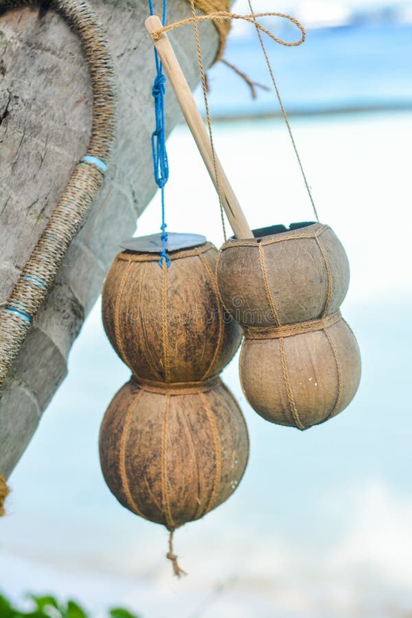 Small Vessels with Ropes Made from Coconut Shells Stock Image - Image ...