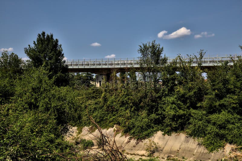 Small Viaduct in the Countryside Framed by Trees and a Clear Sky Stock ...
