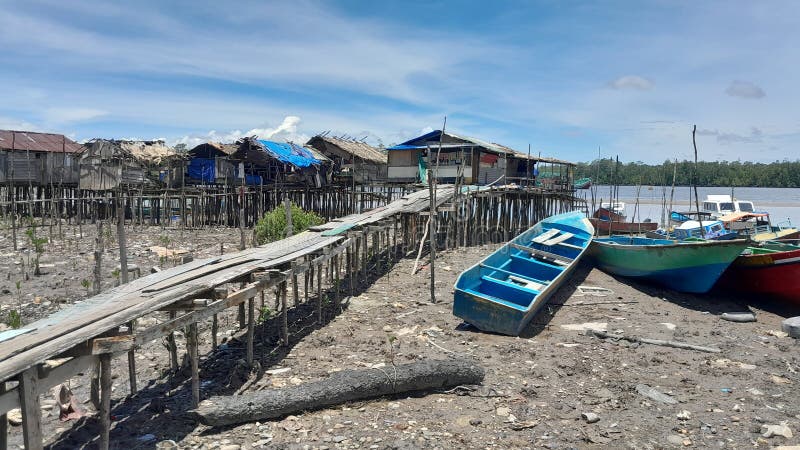A Small Village of the Kamoro on the River Bank Stock Image - Image of ...