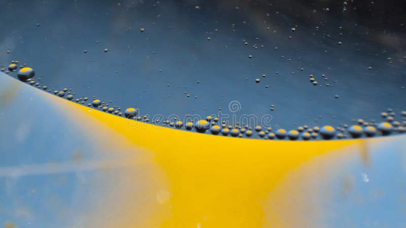 Small Water Bubbles with Blue and Yellow Stock Photo - Image of ...