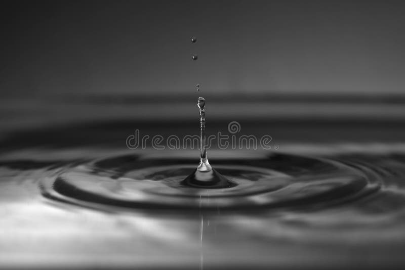 A Small Water Drop Fall on Water Surface Stock Image - Image of circle ...