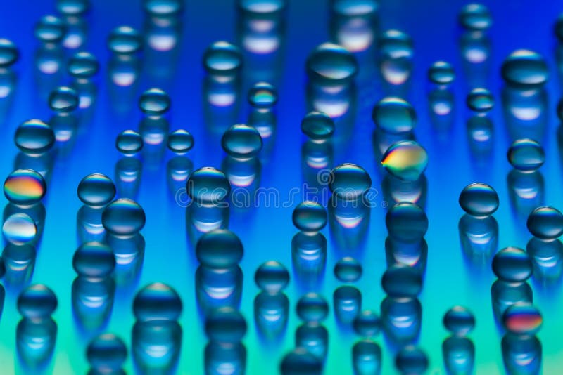 Small Water Drops Over Blue Stock Photo - Image of lens, freshness: 3553424