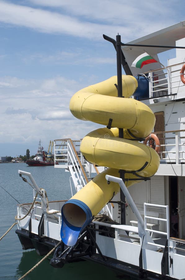 A Small Water Slide Falling into the Sea from Ship Stock Photo - Image ...
