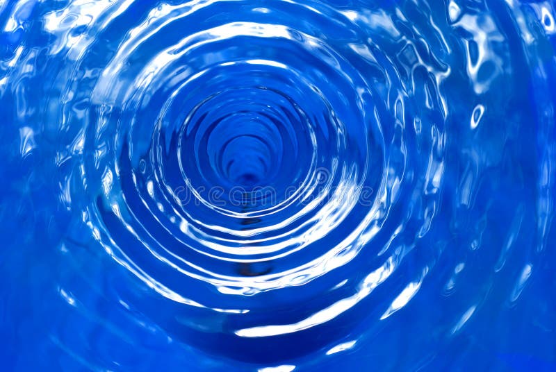 Water Vortex or Swirl, Causing Circular Waves on the Surface Stock ...