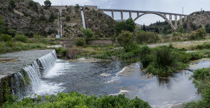 Small Waterfall in the Bed of the Guadalfeo River with the Aqueduct in ...