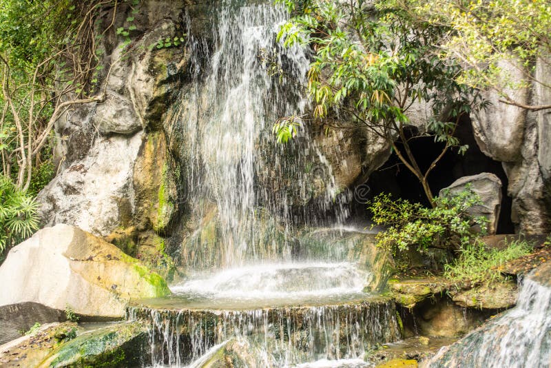Small Waterfall Built Inside the Garden To Look Naturally Beautiful ...